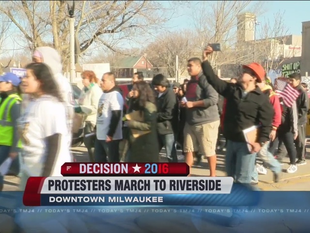 Protesters march to Riverside before Town Hall