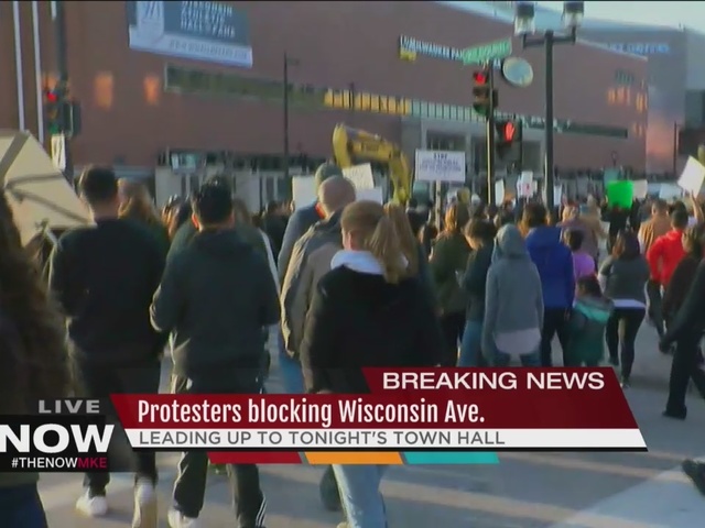 Protesters march to Riverside before Town Hall