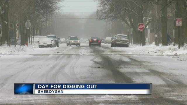 Sheboygan residents spend Saturday shoveling through winter's return ...