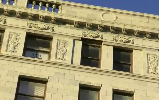 Piece of building falls 8 stories onto SUV below - TMJ4 Milwaukee, WI